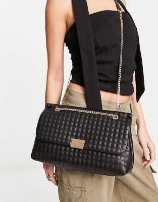 Dune quilted PU chain strap cross body bag in black | ASOS