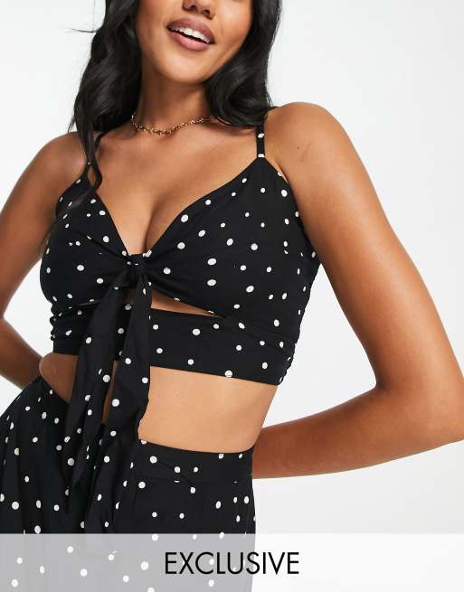 Esmee Exclusive tie front beach crop top in polka dot black | ASOS