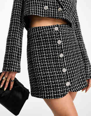 Exclusivité - The Frolic - Mini-jupe d'ensemble en bouclé avec boutons à strass - Noir et blanc ...