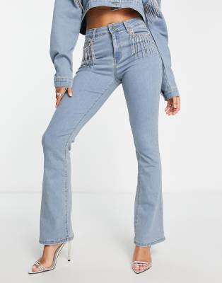 Fae high waist flared jeans with diamante fringe in washed blue | ASOS