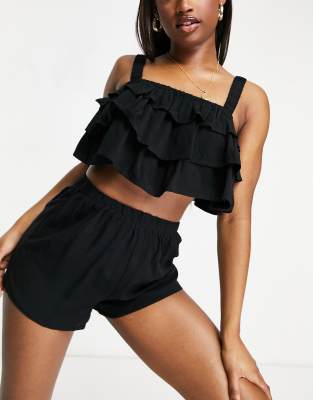 Fashion Union Exclusive ruffle beach crop top in black set | ASOS