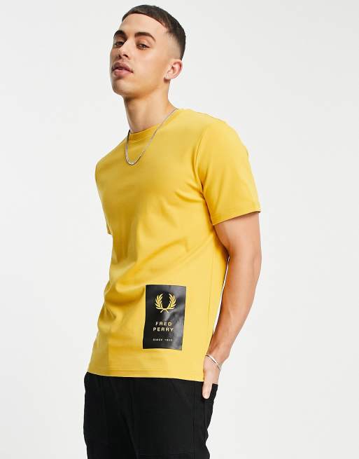 Fred Perry hem patch logo t-shirt in yellow | ASOS