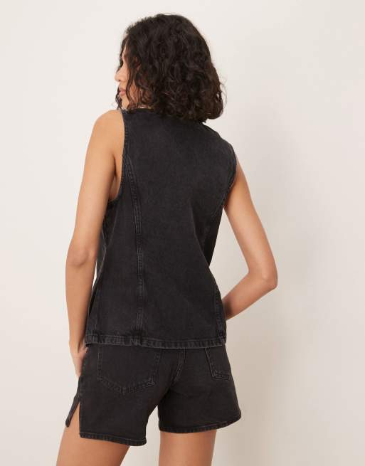 Free People aimee button up denim vest in black | ASOS
