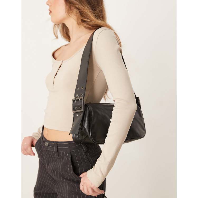 Free People arm candy leather shoulder bag in black | ASOS