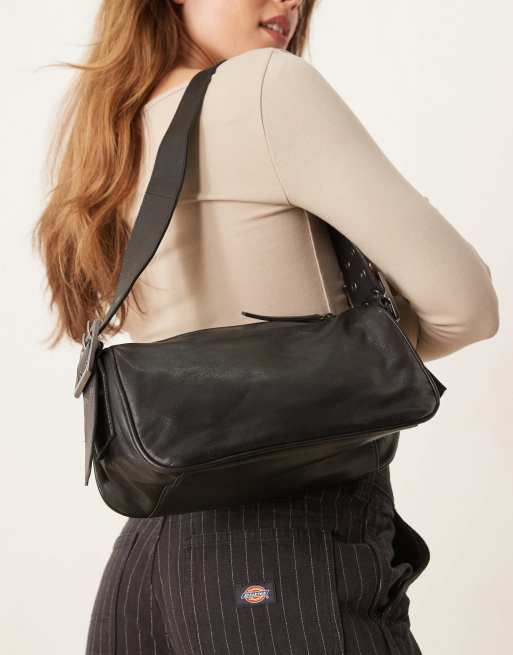 Free People arm candy leather shoulder bag in black | ASOS