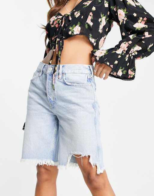 Free People raw edge denim longline shorts in washed blue | ASOS