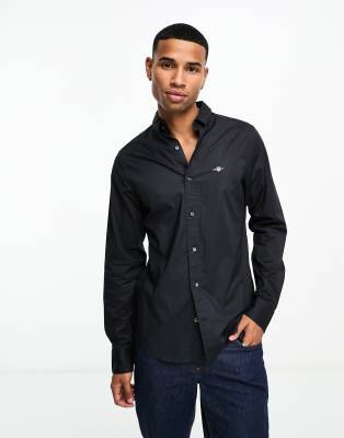GANT icon logo slim fit poplin shirt in black | ASOS