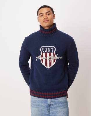 GANT wool blend roll neck knit jumper with embroidered logo in navy | ASOS