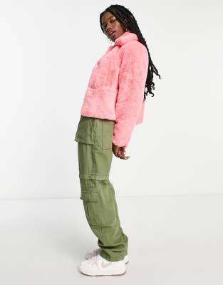 Girlfriend Material Jax short faux fur jacket in pink | ASOS