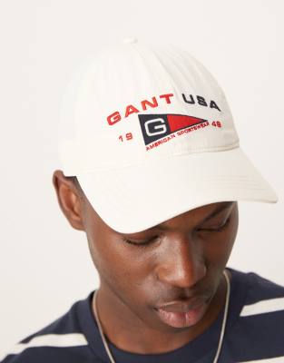 Gorra de béisbol color crema con logo de bandera y texto "USA" de GANT ...