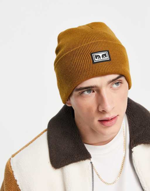 Gorro color marrón con ojos icónicos de Obey | ASOS