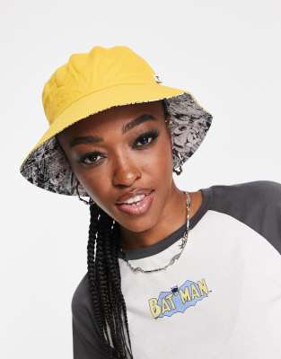 Guess Originals batman reversible bucket hat in yellow | ASOS