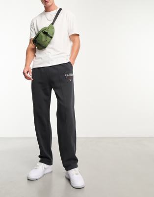 Guess Originals logo sweatpants in black | ASOS