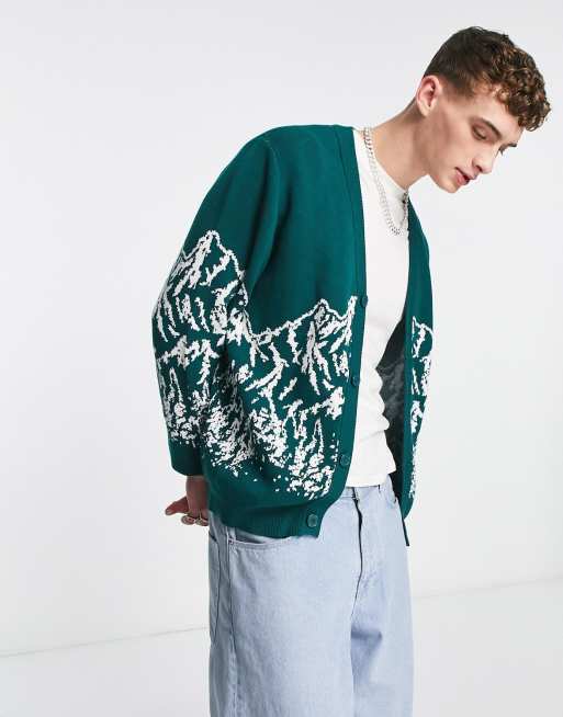 GUESS Originals – Strickjacke in Grün mit Berg-Motiv | ASOS