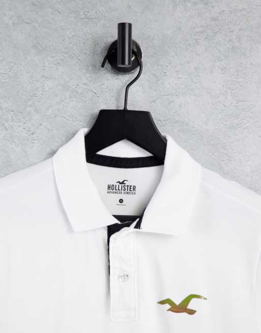 Hollister exploded reflective icon logo slim fit pique polo in white ASOS