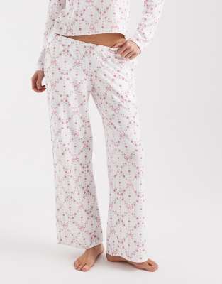 Hollister – Pyjamasunderdel med låg midja, rosa rosettmönster och vida ...
