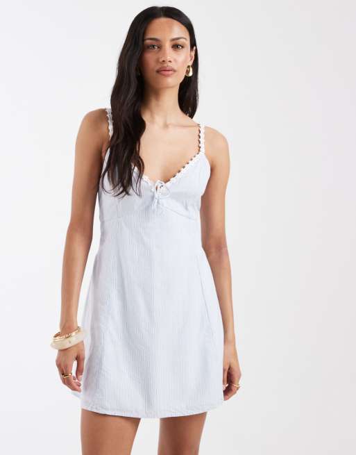 Hollister - Vestido corto azul abotonado con cuello de pico y raya ...