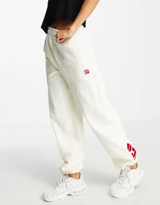 HUGO relaxed trackies in cream | ASOS