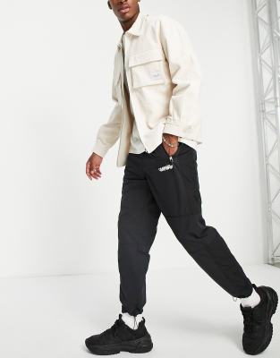 Hugo x Vertere Daptere trackies in black | ASOS