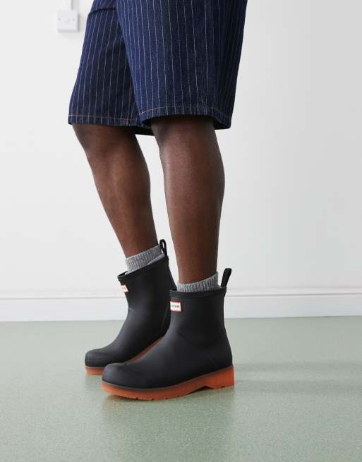 Hunter Play short boots with translucent sole in black | ASOS