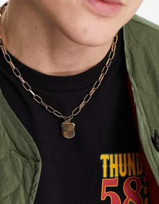 Icon Brand shield pendant necklace in gold | ASOS