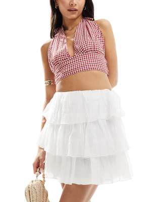 In The Style ruffle tiered mini rara skirt in white | ASOS