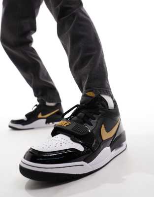 Jordan Air Legacy 312 Low trainers in black and gold | ASOS