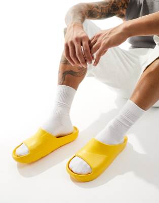 Jordan Post sliders in yellow | ASOS