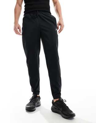 Jordan Sport Dri-Fit woven joggers in black | ASOS