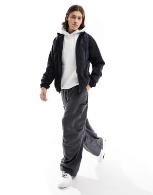 Jordan track jacket in black | ASOS