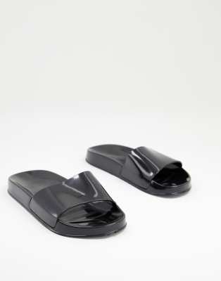 Juju - Claquettes plates en plastique souple - Noir | ASOS