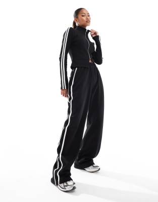 Kaiia exclusive ribbed side stripe wide leg trackies in black (part of ...