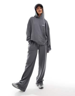 Kaiia studio bubble logo wide leg trackies in washed grey and lilac | ASOS