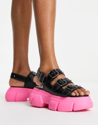 KOI Sticky Secrets chunky sandals with pink sole in black | ASOS