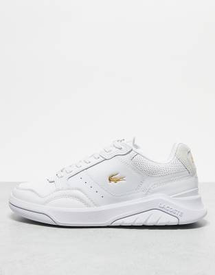 Lacoste Game Advance trainers in white and gold | ASOS
