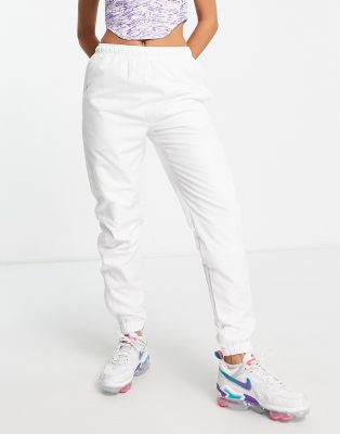Lacoste slim fit trackies in white | ASOS