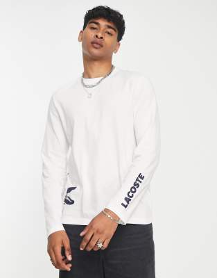 Lacoste - Top confort à manches longues et logo - Blanc | ASOS