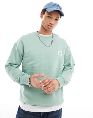 Lee workwear label logo sweatshirt relaxed fit in light green | ASOS