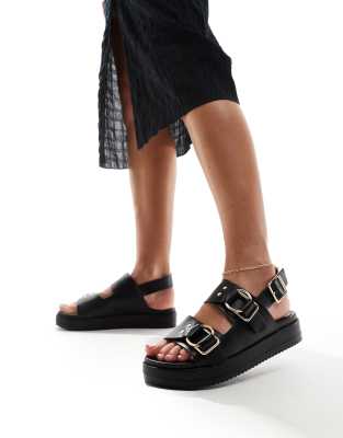 London Rebel flatform buckle sandals in black | ASOS