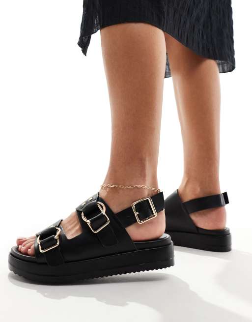 London Rebel flatform buckle sandals in black | ASOS