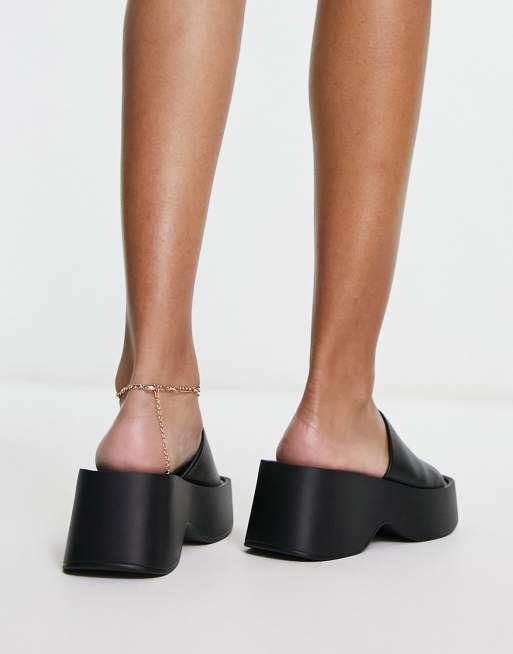 London Rebel flatform square toe slides in black | ASOS