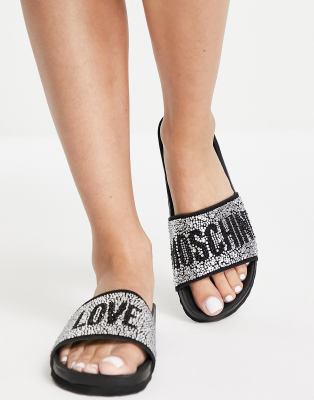 Love Moschino rhinestone logo slides in black | ASOS