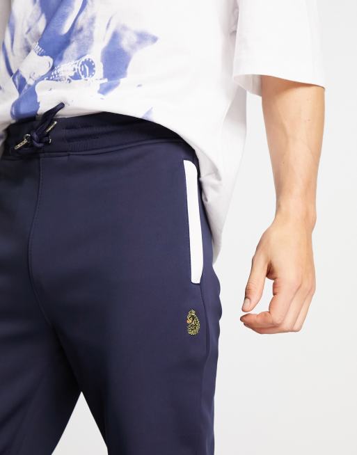 Luke jersey trackies in navy & white | ASOS