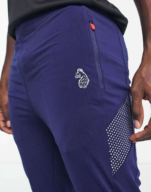 Luke training trackies in navy | ASOS