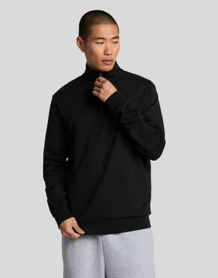 Lyle & Scott tonal eagle quarter zip sweat in jet black | ASOS