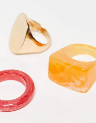 Madein 3 pack of rings in gold, orange and red | ASOS