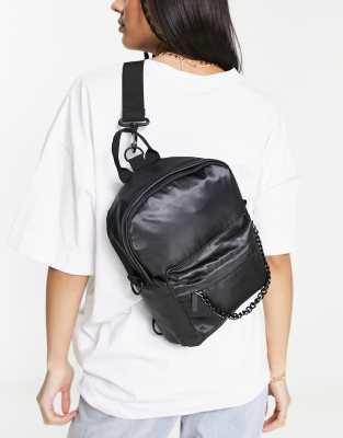 Madein. mini backpack with chain detail in black satin | ASOS