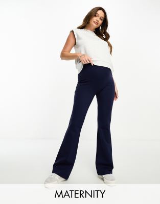 Mamalicious Maternity over-the-bump seam detail flare pants in navy | ASOS