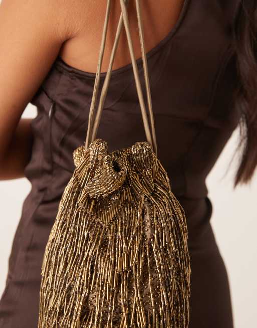 Mango embellished drop bead detail drawstring bag in gold | ASOS