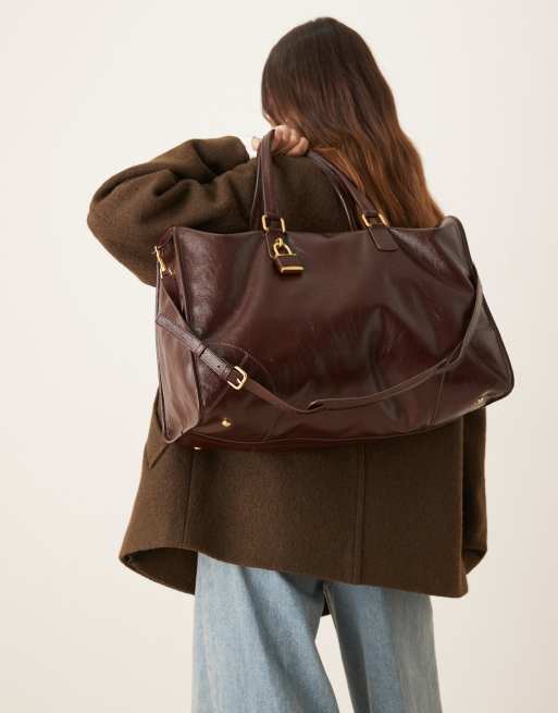 Mango leather lock charm cross body city bag in dark brown | ASOS
